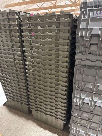 Stack of Gray Industrial Plastic Storage Bins with Interlocking Design ...