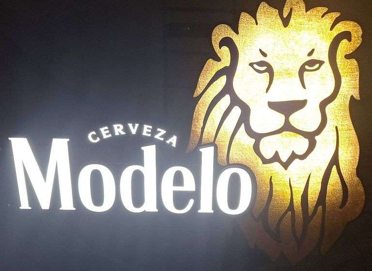 Illuminated Modelo Cerveza Lion Sign - Metzger Property Services, LLC