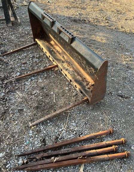Universal quick attach 54” manure bucket, 4 tines removed so he could ...