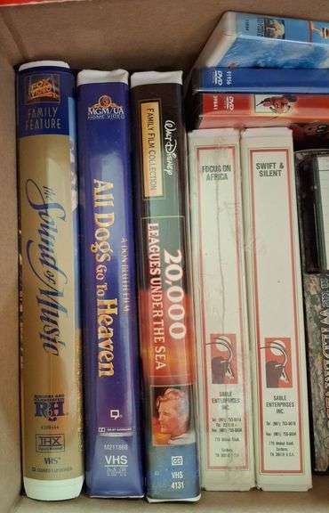 Box of VHS Tapes and Hardcover Books Including W.E.B. Griffin and Dale ...