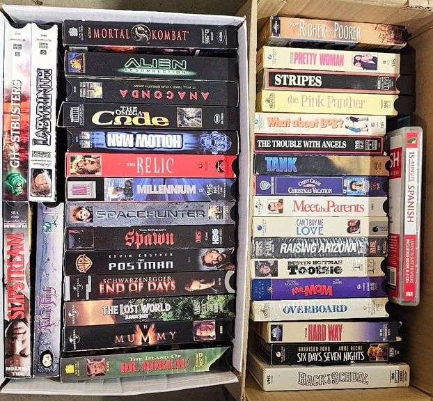 VHS Tape Assortment Featuring Movies from Various Genres - Metzger ...