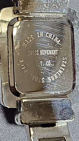 Bangle spring hinge womens watch - Metzger Property Services, LLC