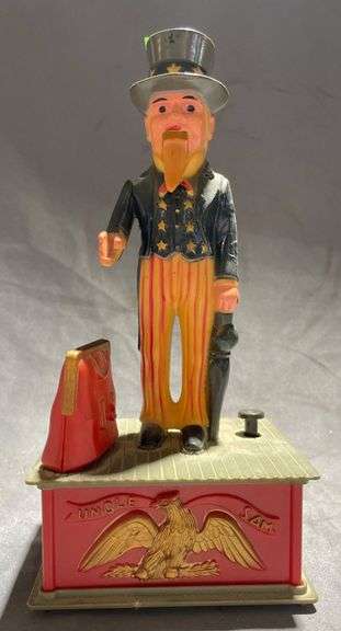 Plastic Uncle Sam Mechanical Bank - Metzger Property Services, LLC