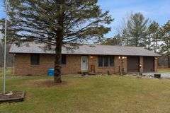 8.25+- ACRES FEATURING RANCH HOME WITH POLE BARN! RECREATIONAL WOODS ...