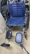 Invacare Manual Wheelchair with Blue Cushioned Seat and Leg Rests ...