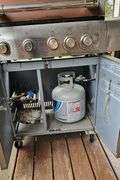 BHG Gas Grill with Partial Filled Tanks and Spatula - Metzger Property ...