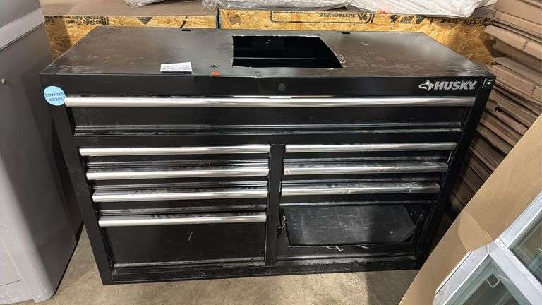 Husky 46” tool box, has cuts made in it and left side drawers do not ...