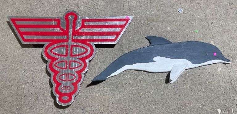 Medical Symbol Wall Decor and Dolphin-Shaped Artwork - Metzger Property ...