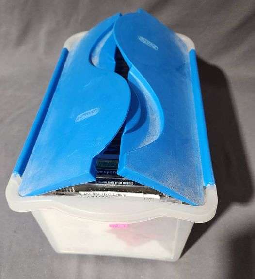 Plastic Storage Container with Assorted Music CDs - Metzger Property ...