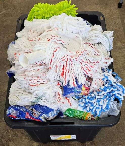 Bin of Cleaning Mop Heads and Accessories - Metzger Property Services, LLC