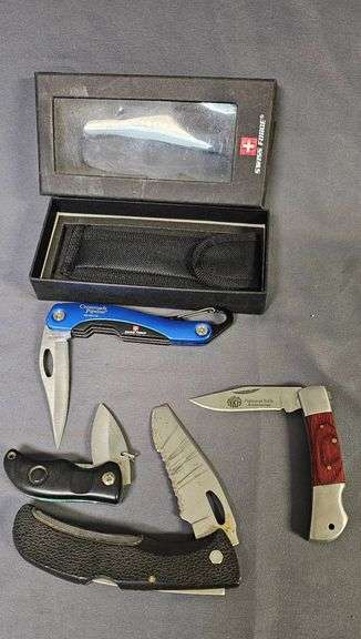 Set of Four Folding Knives with Box Including Swiss Force and Other ...