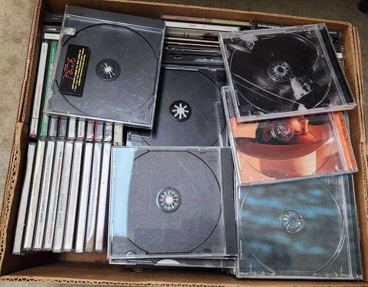 Empty CD Cases with Visible Artwork Inserts - Metzger Property Services ...