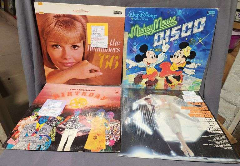 Vinyl Records With Album Covers Featuring Various Genres and Artists ...