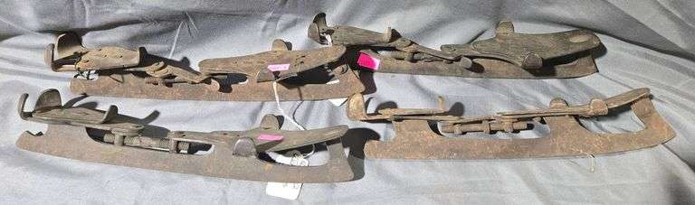 Four Steel Ice Skate Blade Frames - Metzger Property Services, LLC