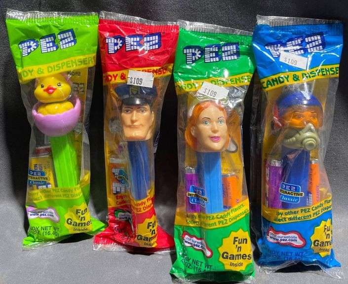 Four PEZ Candy Dispensers in Original Packaging - Metzger Property ...
