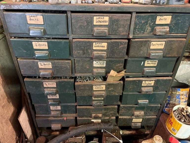Metal Cabinet With Drawers Containing Bolts, Washers, and Fasteners ...