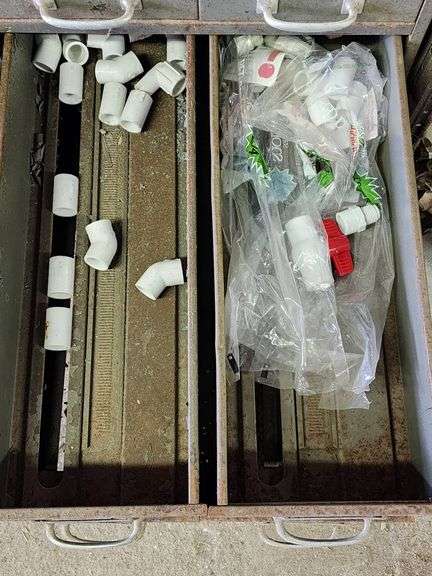 Metal Filing Cabinet with 10 Drawers Containing Various PVC Pipe ...
