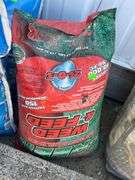 Bag of Lawn Fertilizer and Bag of Charcoal Briquets - Metzger Property ...