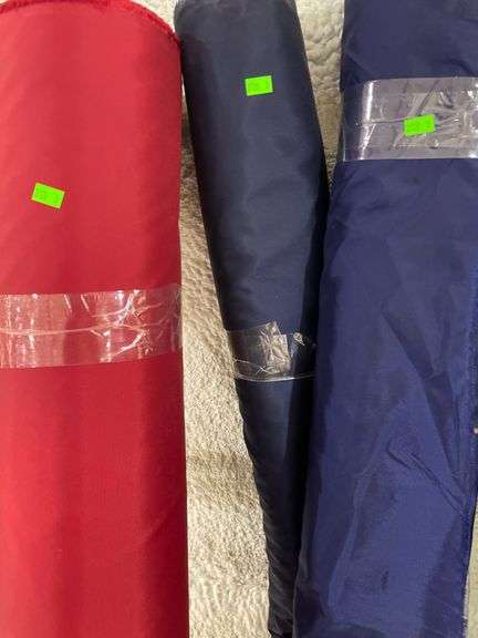 3 – Rolls of Fabric in Red and Blue Shades - Metzger Property Services, LLC
