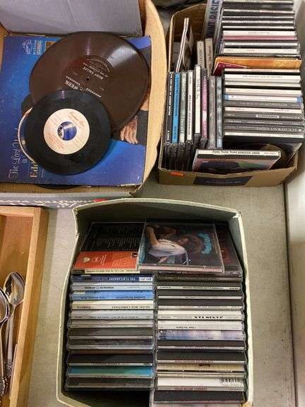 CD & Record Assortment - Metzger Property Services, LLC