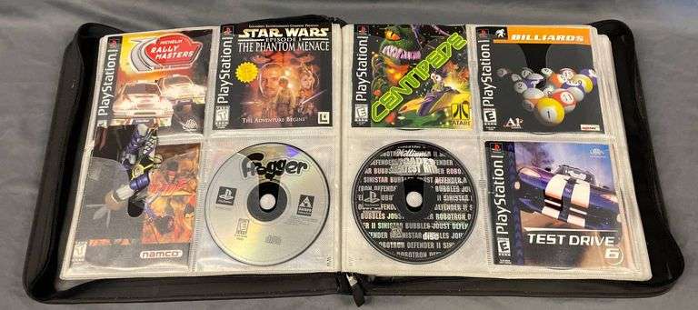 Binder Containing 84 PlayStation 1 Game Discs & 10 Dreamcast Games ...