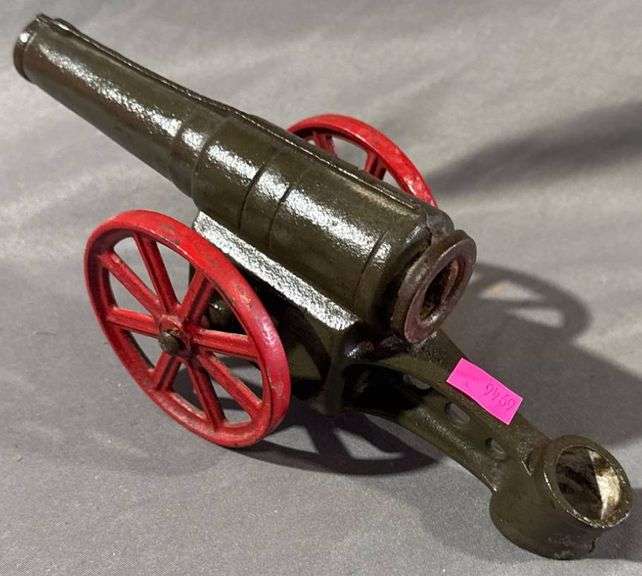 Cast Iron Miniature Cannon with Red Spoked Wheels - Metzger Property ...
