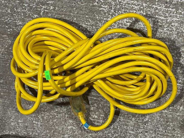 Yellow Heavy-Duty Extension Cord with Plug - Metzger Property Services, LLC