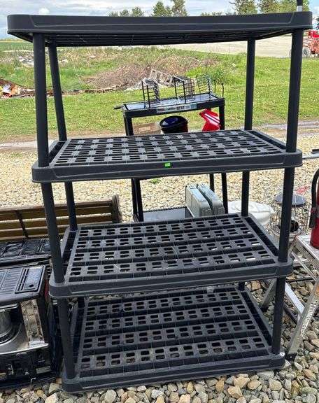 Four-Tier Black Plastic Shelving Unit - Metzger Property Services, LLC