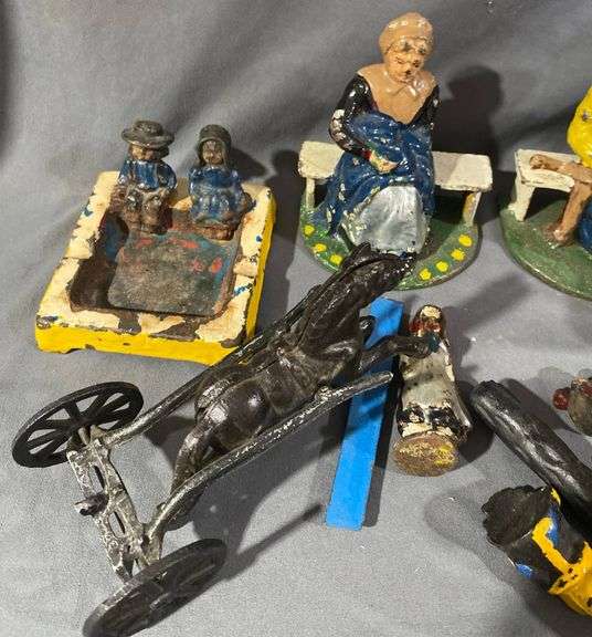 Cast Iron Figurines and Toys Including Horse-Drawn Carriages and ...