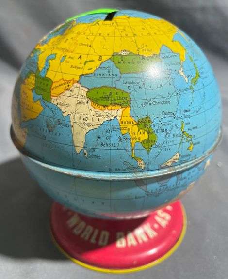 Metal Globe-Shaped Coin Bank with Rotating Feature - Metzger Property ...