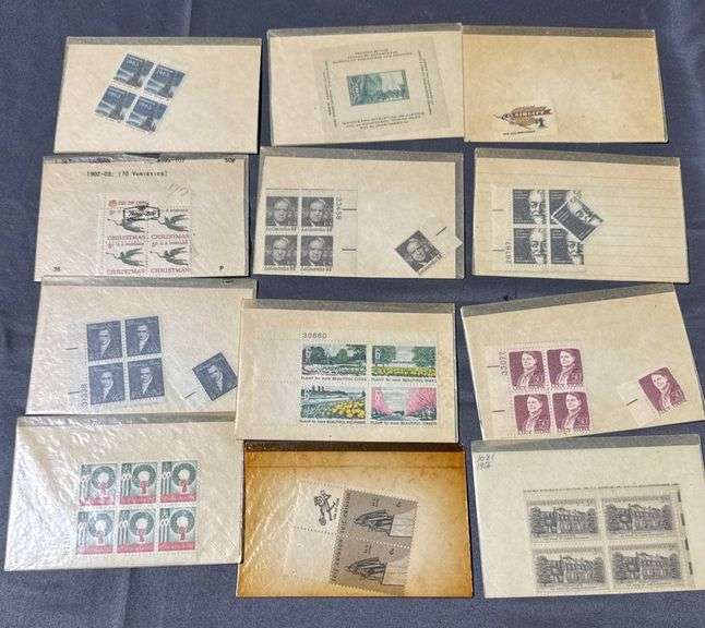 Postage Stamps and Envelope Assortment - Metzger Property Services, LLC