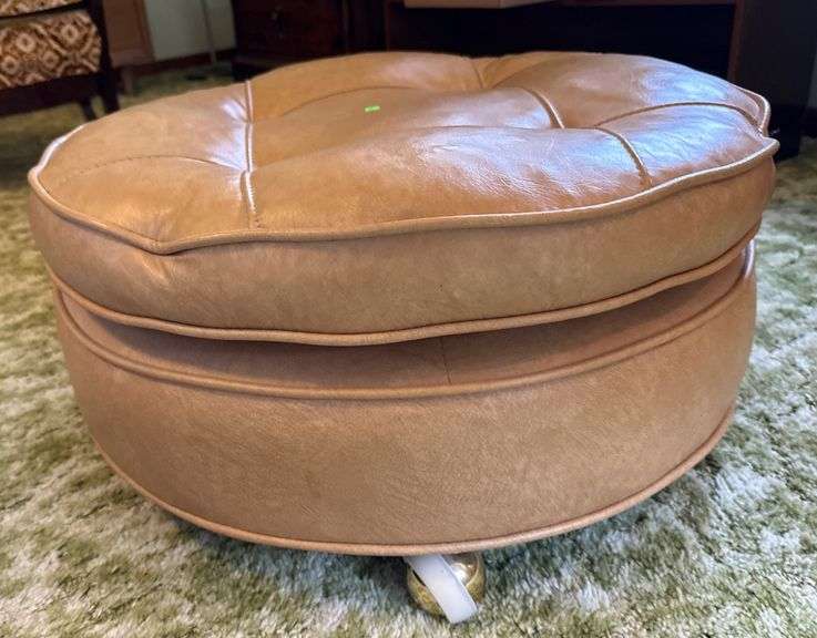 Tan Tufted Round Cushion Ottoman on Caster Wheels - Metzger Property ...