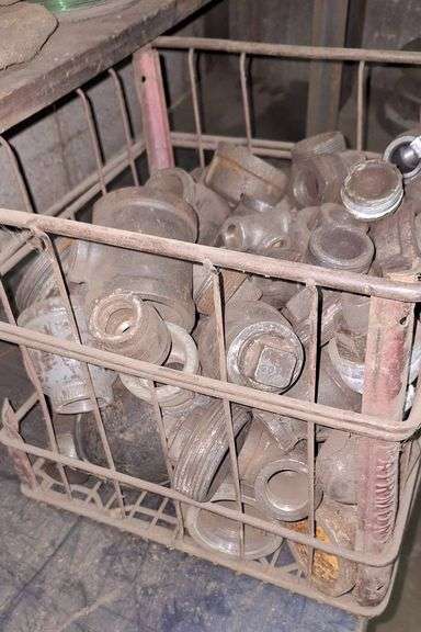 Metal Storage Basket Containing Assorted Industrial Pipe Fittings ...