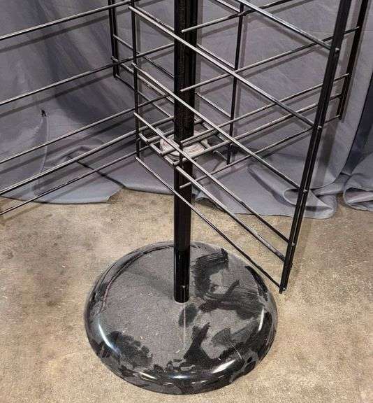 Metal Rotating Display Rack With Wire Grids and Weighted Base - Metzger ...
