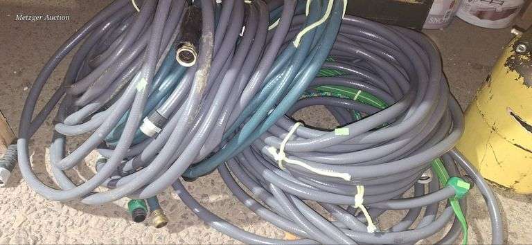 Coiled Gray Water Hoses with Connectors - Metzger Property Services, LLC