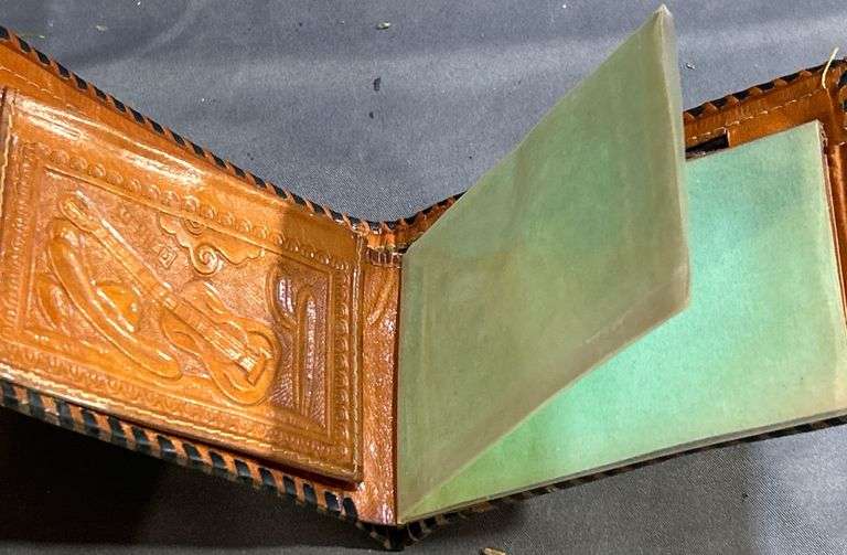 Handmade Embossed Leather Wallets and Cases - Metzger Property Services ...