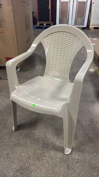 Beige plastic patio chair - Metzger Property Services, LLC