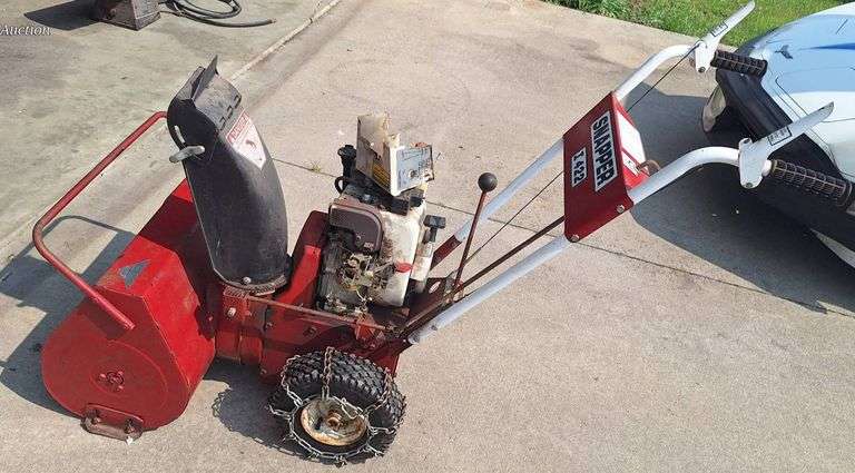 Snapper i422 Snowblower with Metal Auger and Chained Tires - Metzger ...