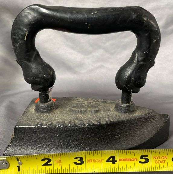 Cast Iron Sad Iron With Curved Handle - Metzger Property Services, LLC
