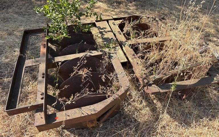 Rusted Steel Agricultural Implement Frames - Metzger Property Services, LLC