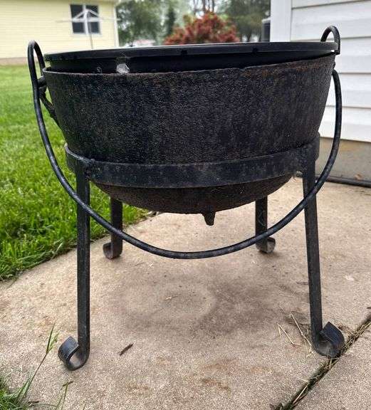 Iron Cauldron with Hinged Handle on Tripod Stand - Metzger Property ...