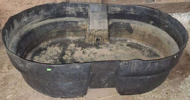 Black Plastic Trough with Top Edge Removed - Metzger Property Services, LLC