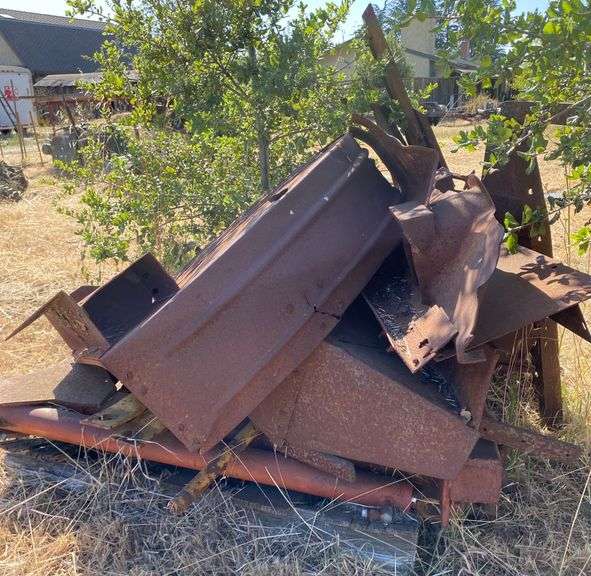 Rusted Metal Scrap and Panels - Metzger Property Services, LLC