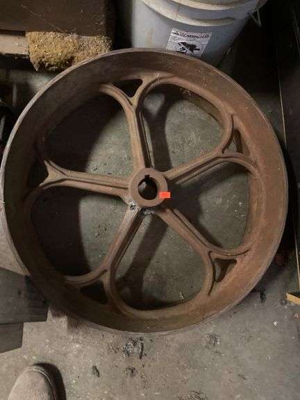 Cast Iron Wheel with Radial Spoke Design - Metzger Property Services, LLC