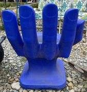 Blue Hand-Shaped Plastic Chair - Metzger Property Services, LLC