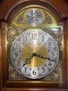 Howard Miller Grandfather Clock with Tempus Fugit Dial and Brass Pendulum - Metzger Property ...