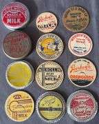 Dairy Memorabilia Including Milk Bottle Caps, Tokens, and Vintage ...