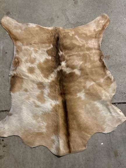 Two Animal Hides in Brown and Tan Tones, 34” x 36” - Metzger Property ...