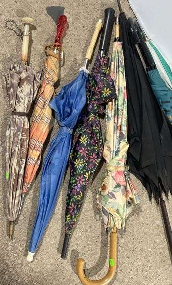 8 Fabric and Metal Umbrellas with Handles - Metzger Property Services, LLC