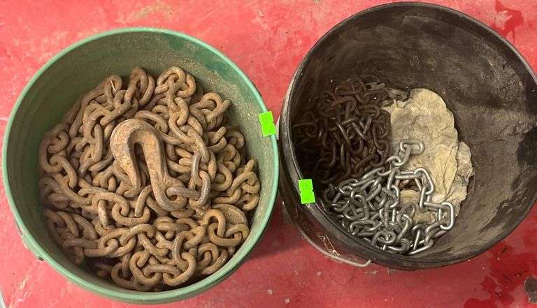 Two Buckets Containing Metal Chains - Metzger Property Services, LLC